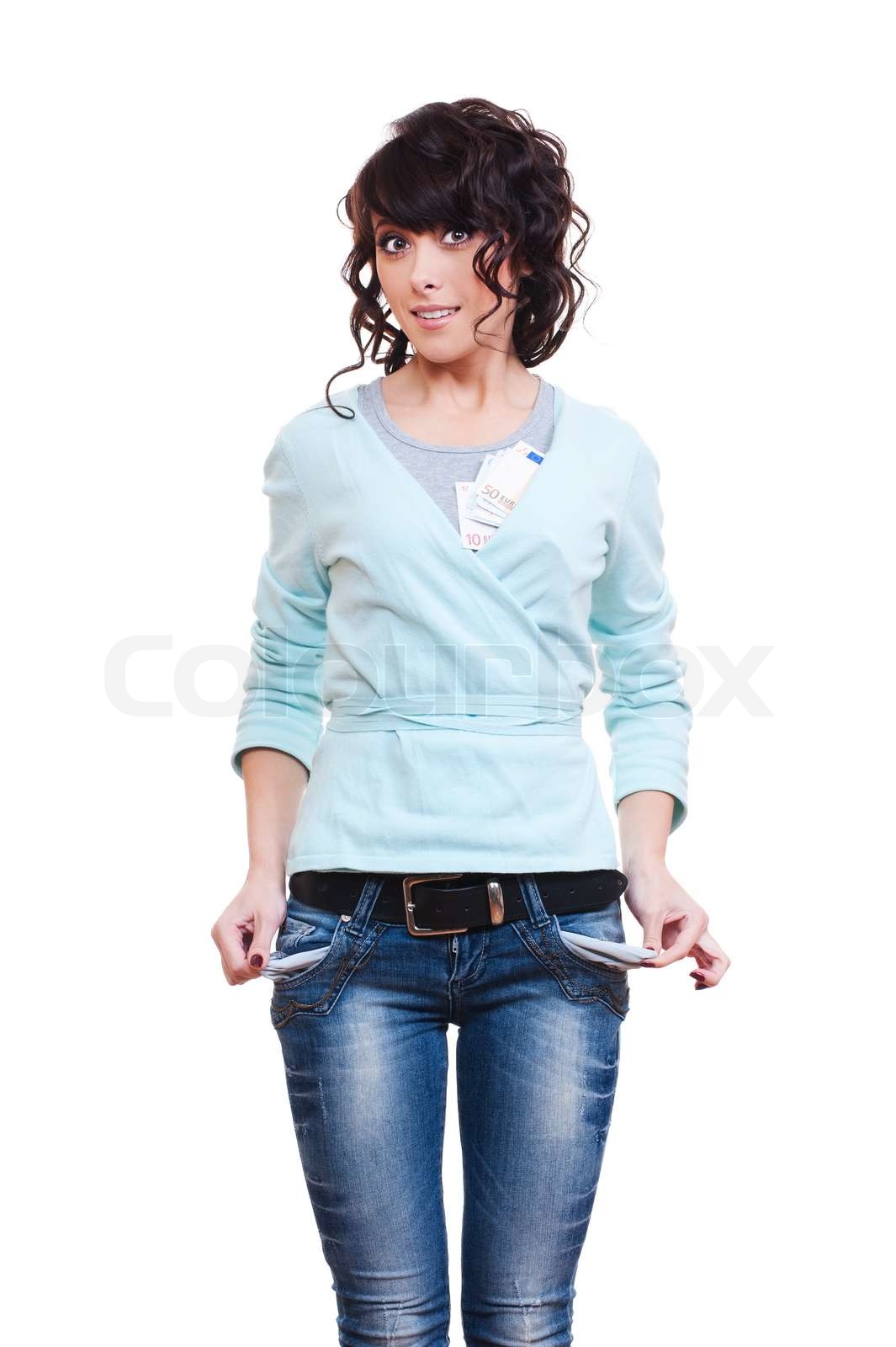 woman showing empty pockets | Stock image | Colourbox