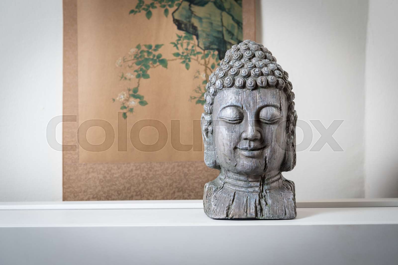 a sculpture of Buddah face | Stock image | Colourbox