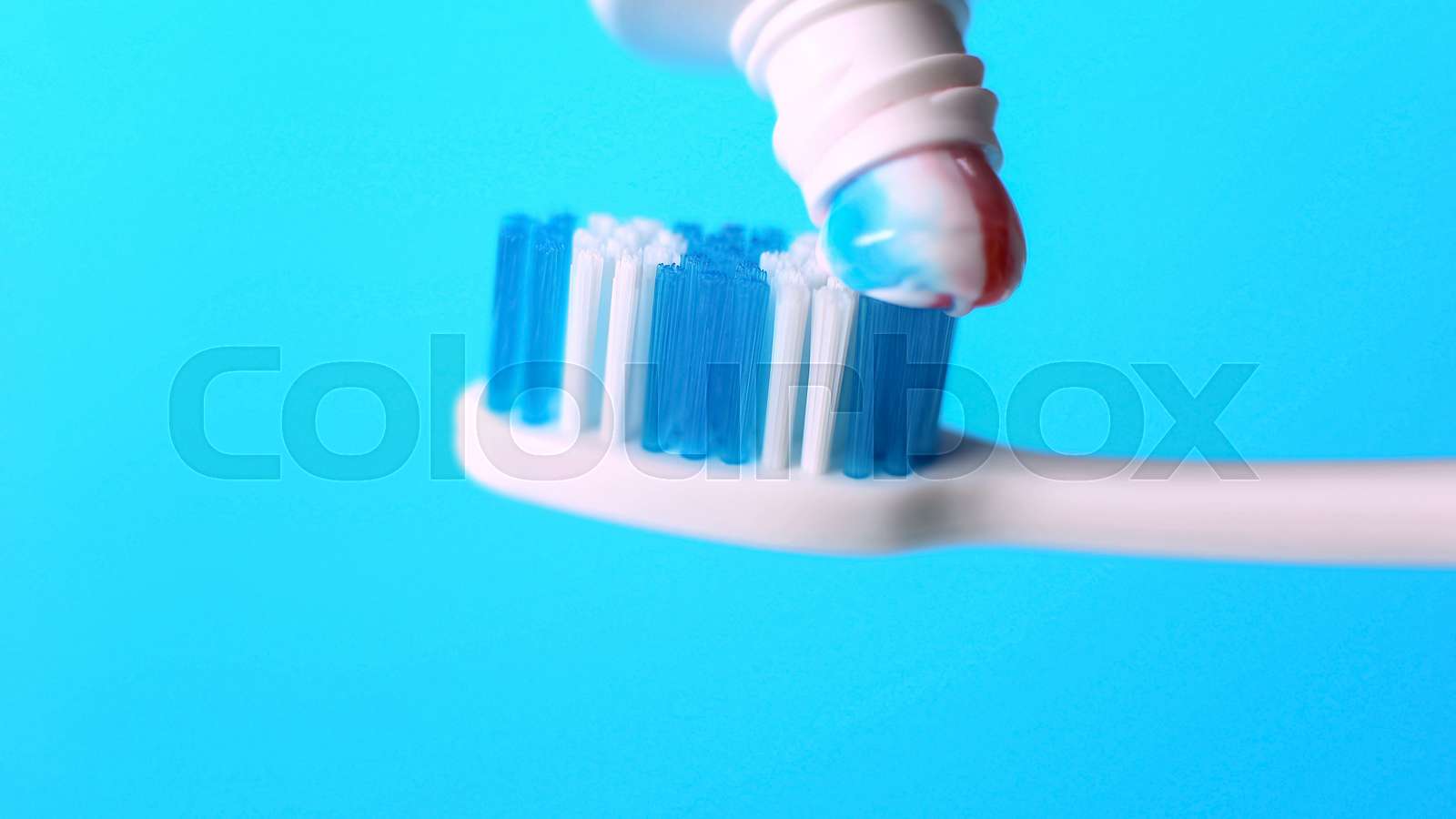 Toothpaste putted on toothbrush, tips and rules for dental healthcare ...