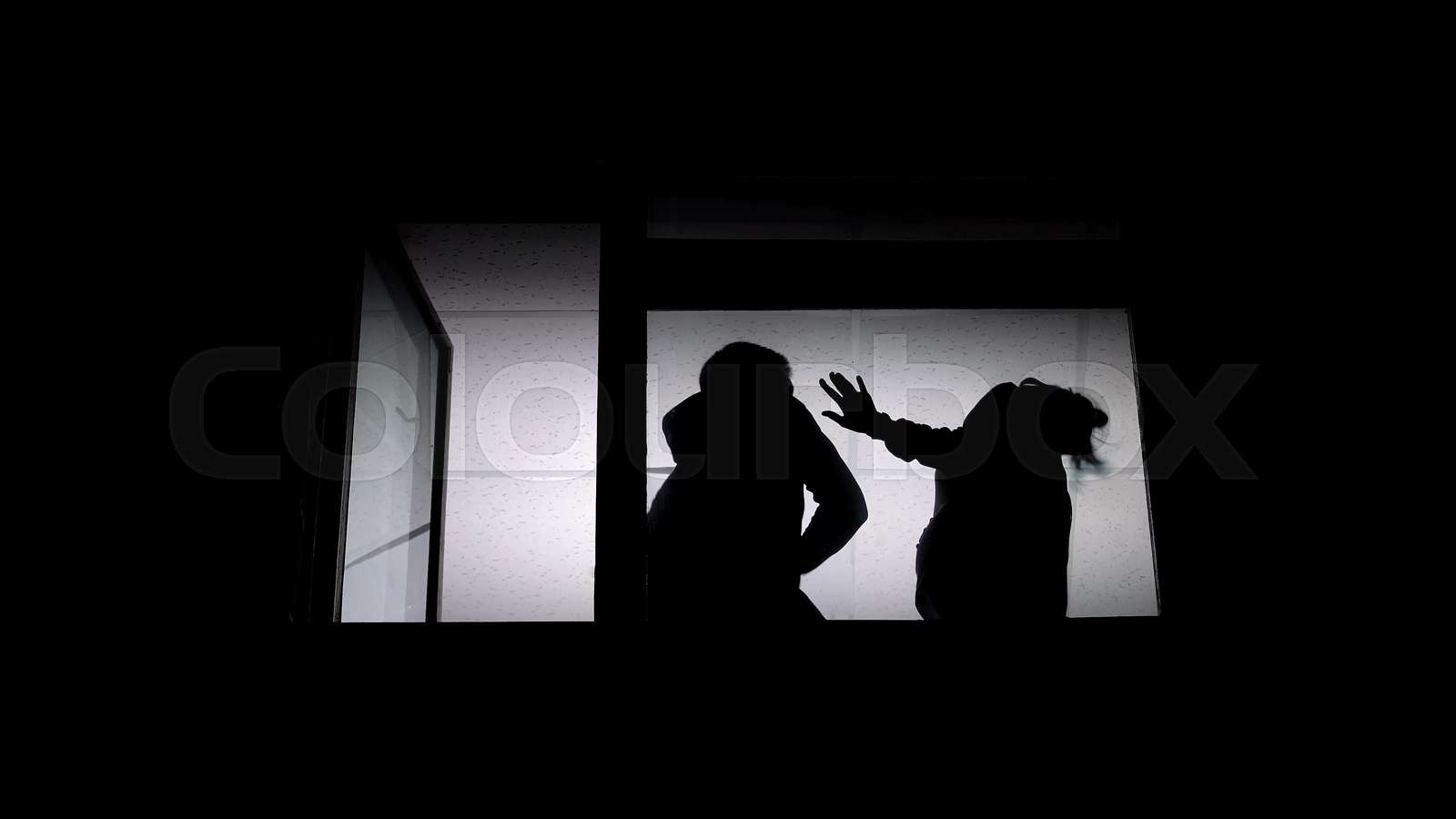 Shadow of husband and wife arguing, man slapping woman, domestic ...