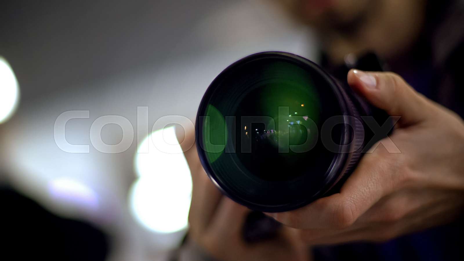 Journalist holding camera taking shots for report, paparazzi spying on ...