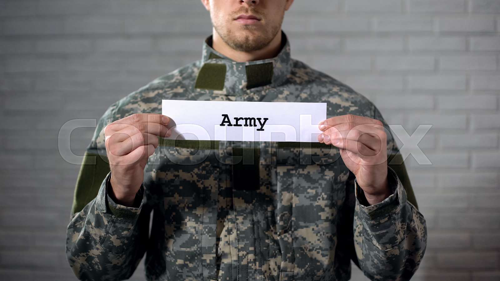 Army word written on sign in hands of soldier, country protection ...
