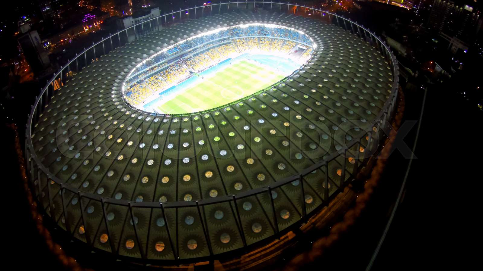 Large football stadium with creative design, night cityscape, view from ...