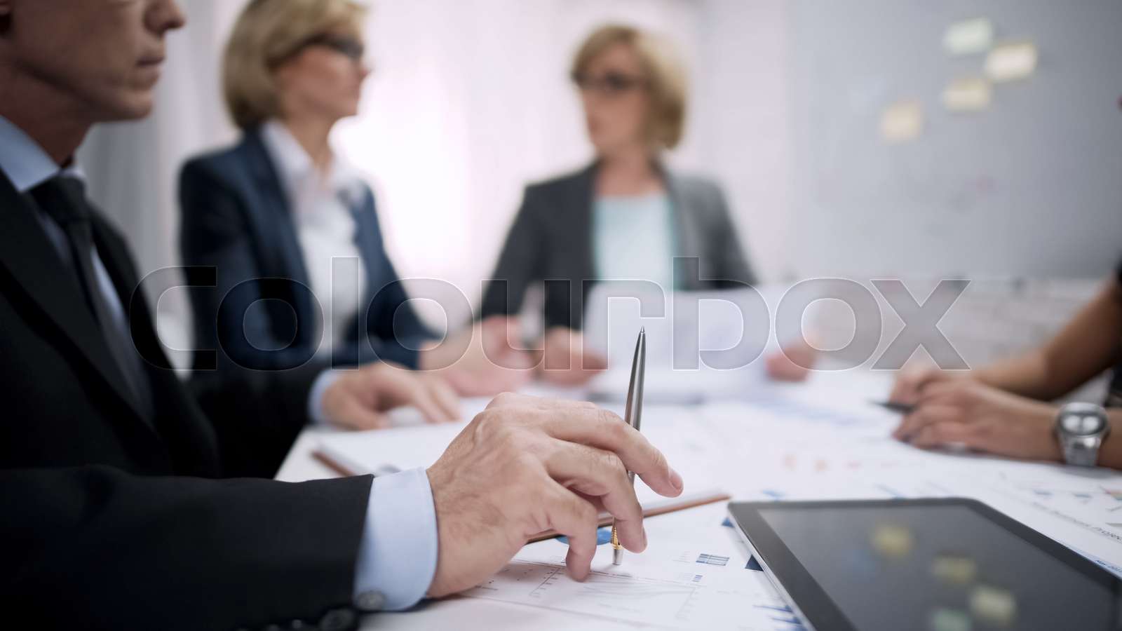 Overworked male office worker bored at meeting, occupational burnout ...