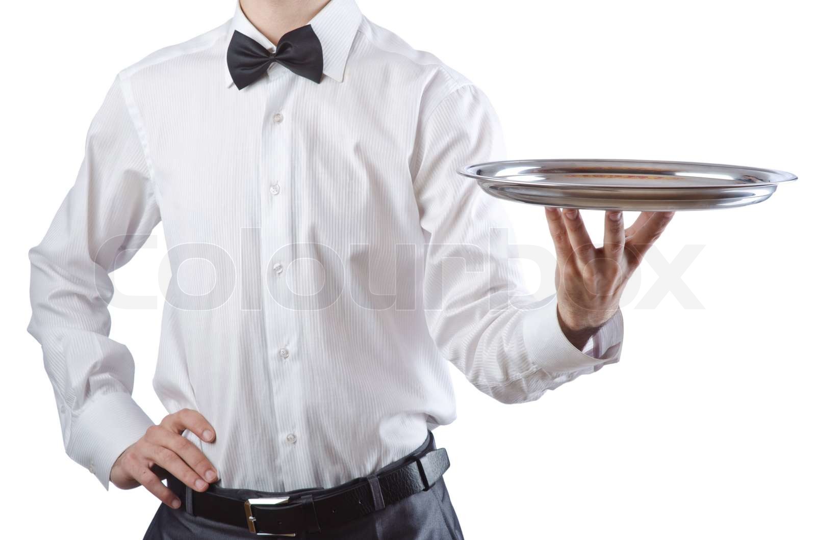 Junge Kellner mit silbernen Tablett | Stock Bild | Colourbox