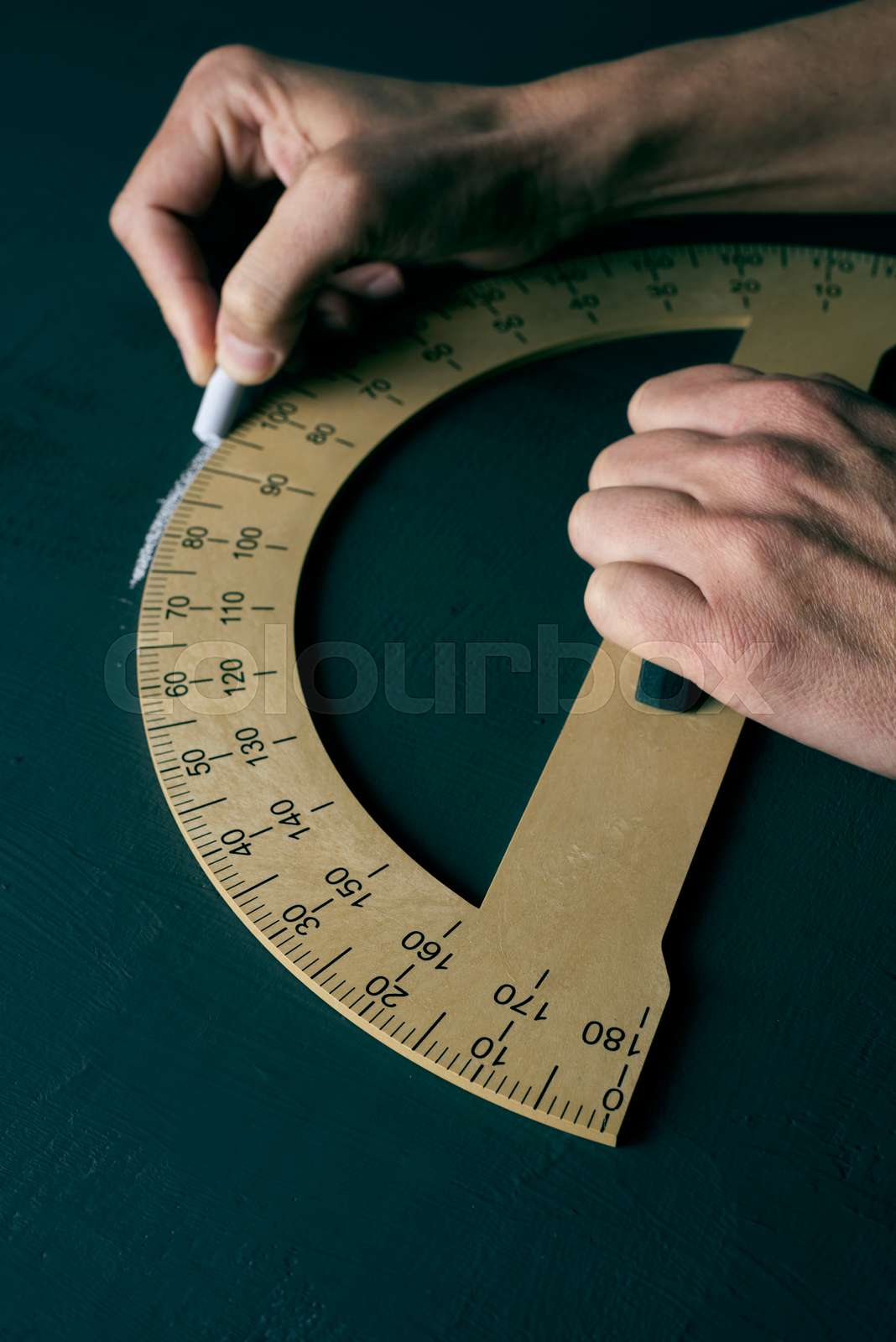 man using a protractor | Stock image | Colourbox