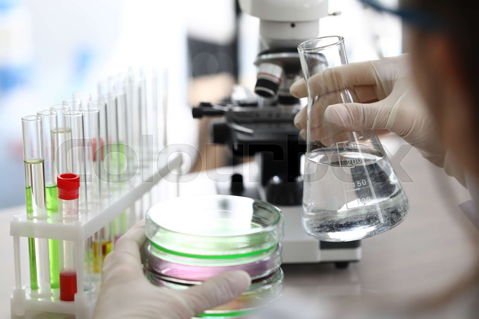 Chemical experience in laboratory, water sample. | Stock image | Colourbox