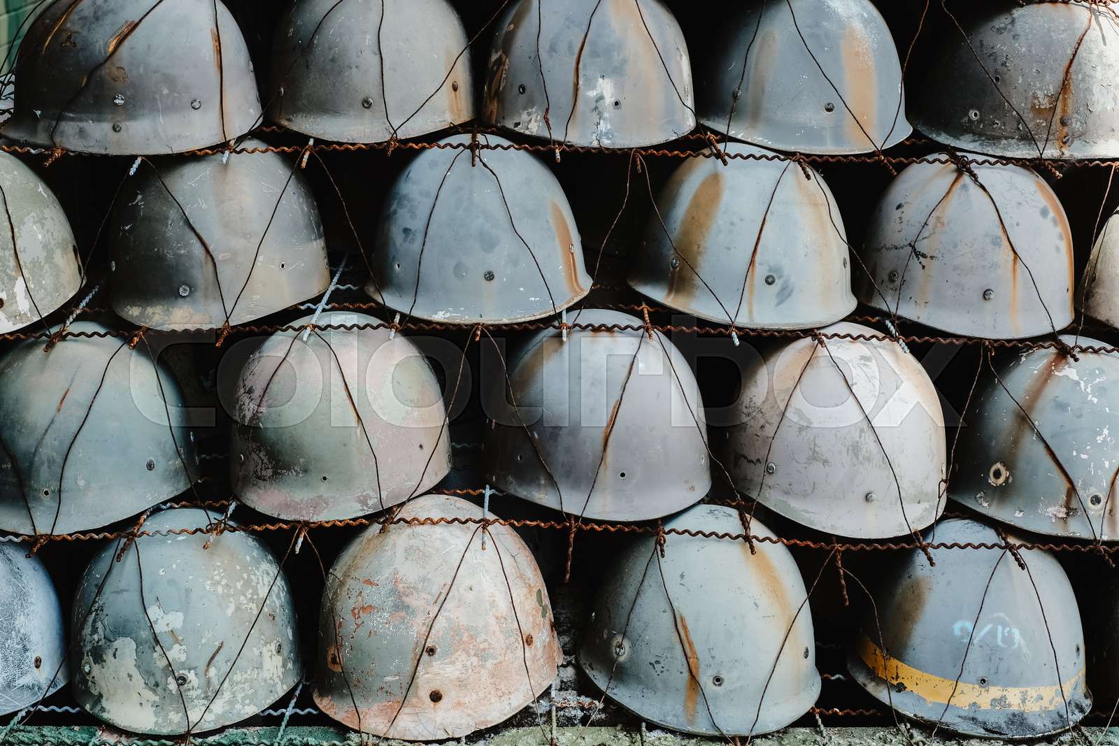 pile of vintage military helmet. | Stock image | Colourbox