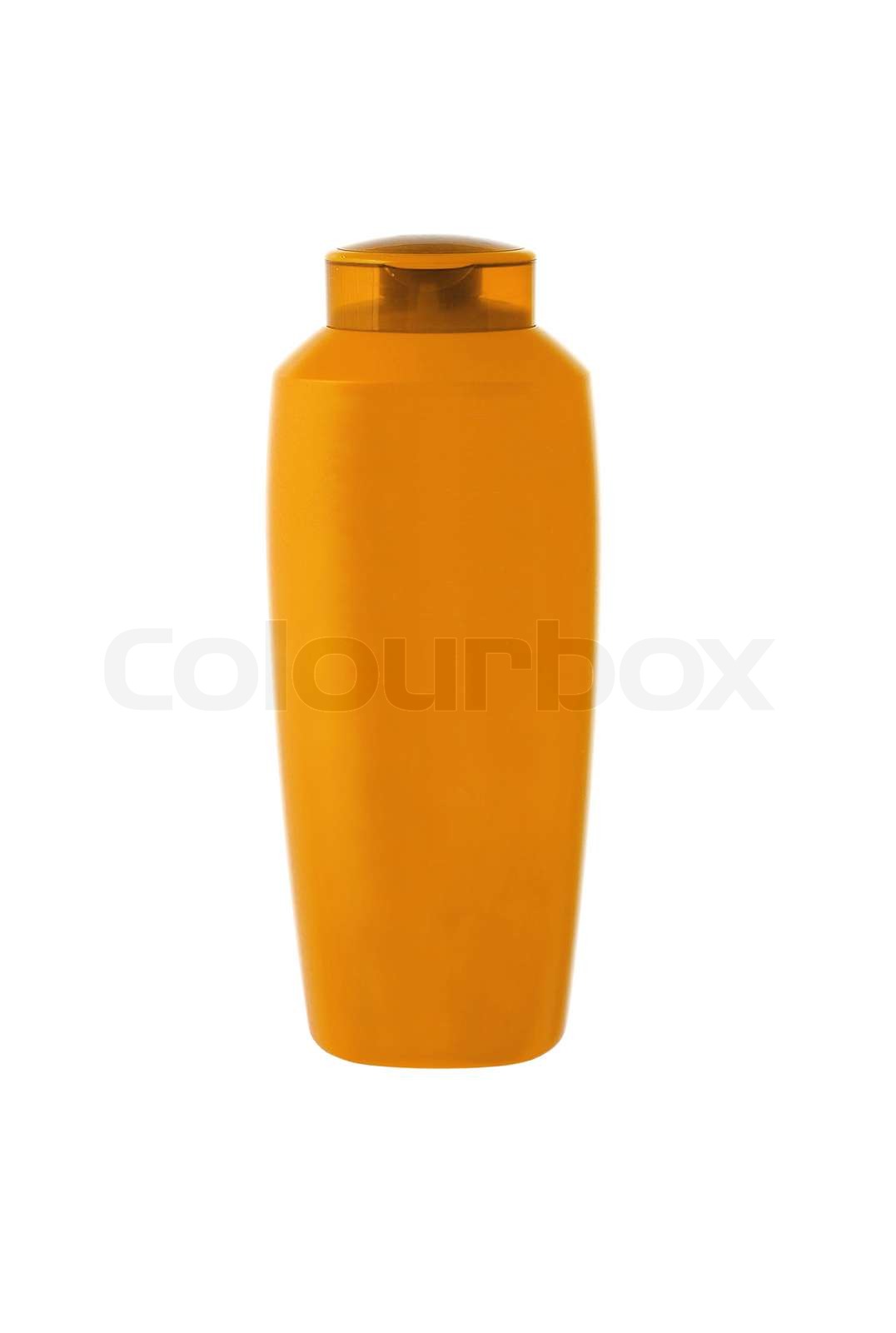 Orange shampoo bottle isolated on white | Stock image | Colourbox