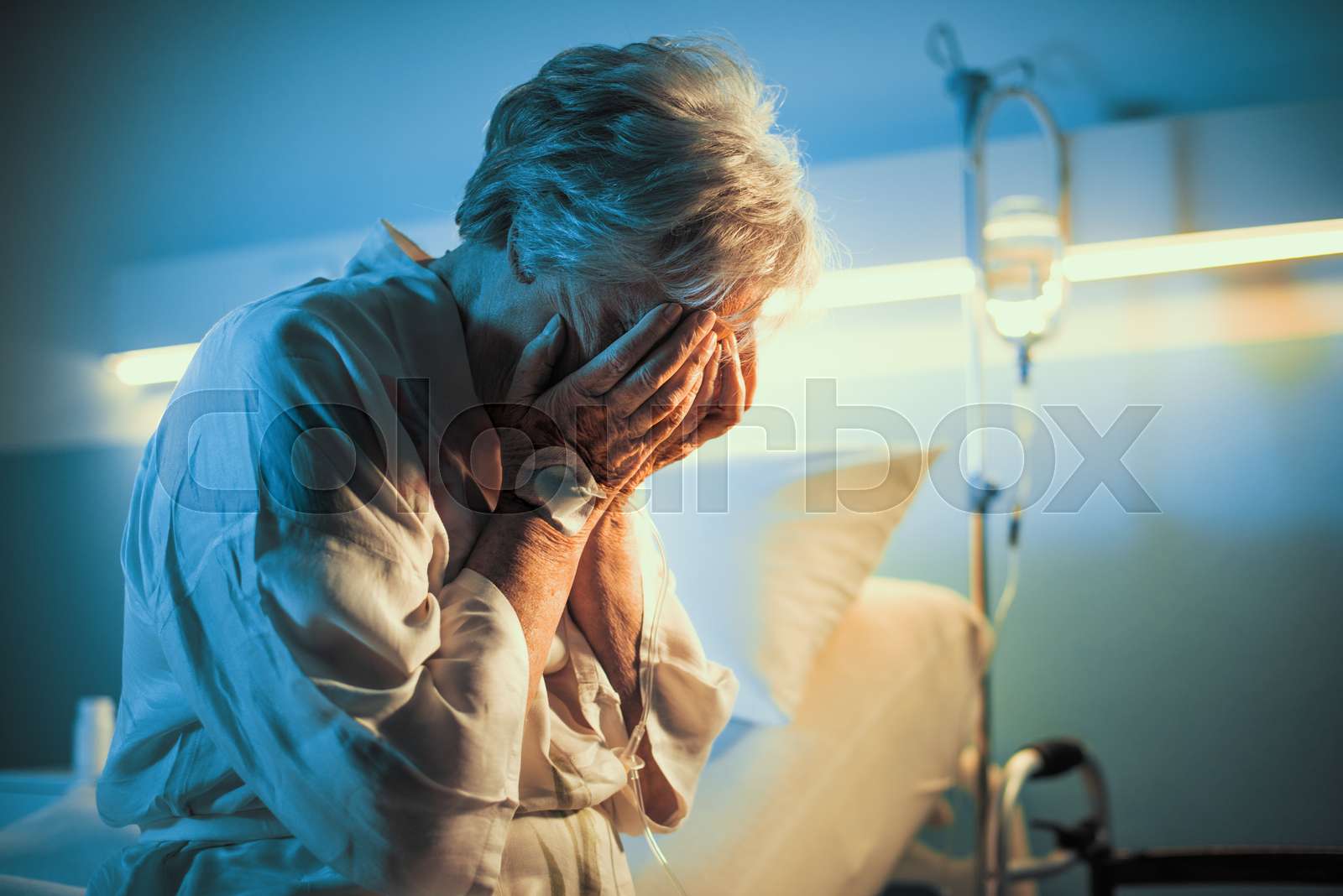 Lonely senior patient crying at the hospital | Stock image | Colourbox