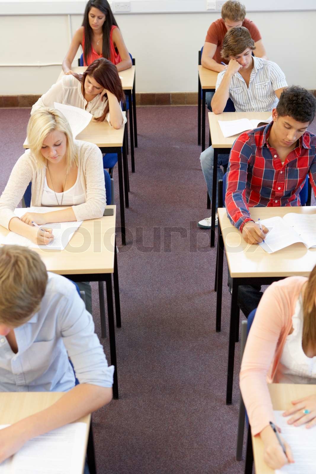 Students sitting exam | Stock image | Colourbox