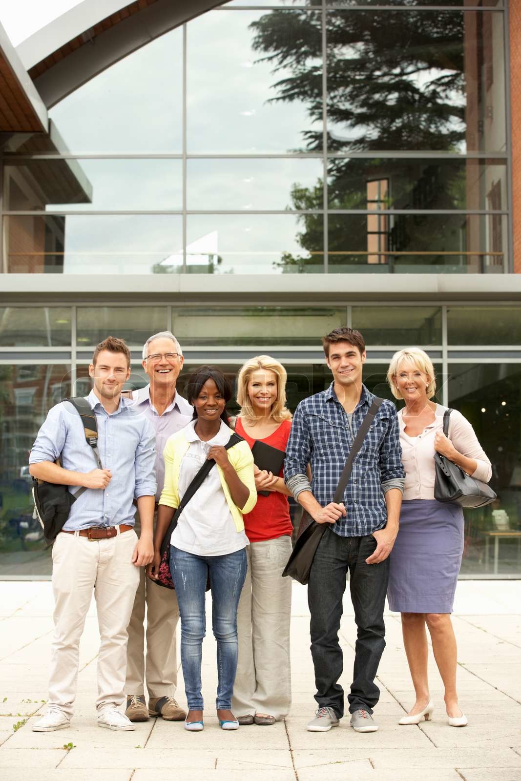 Mixed group of students outside college | Stock image | Colourbox