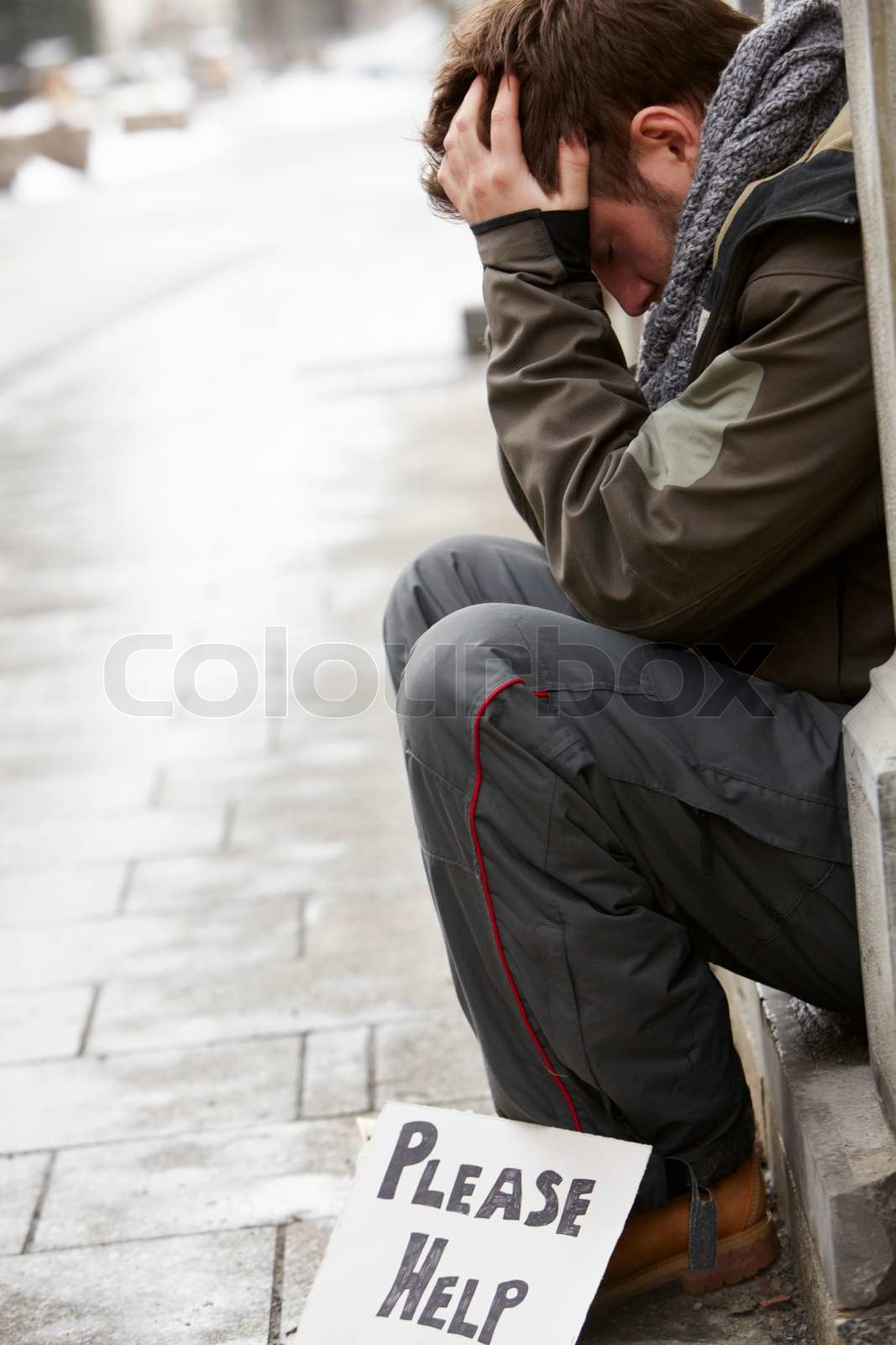 Homeless Young Man Begging In Street | Stock image | Colourbox