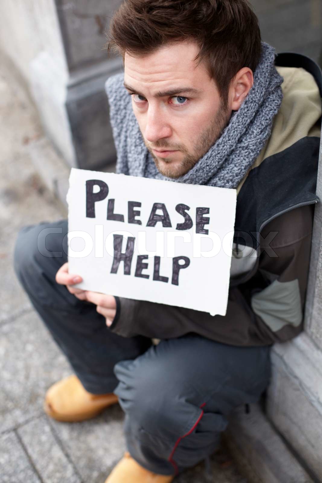Homeless Young Man Begging In Street | Stock image | Colourbox