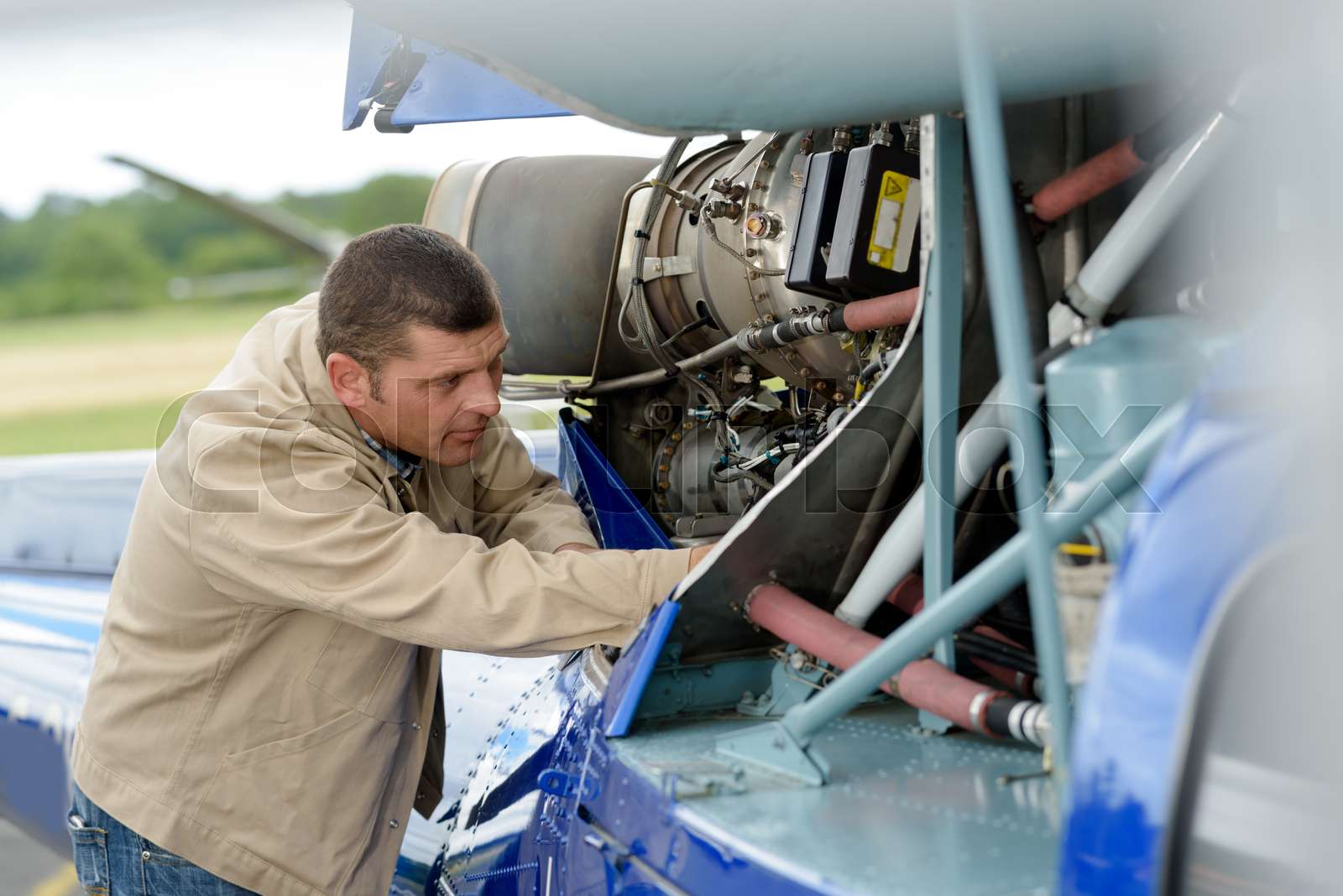 an aircraft maintenance engineer at work | Stock image | Colourbox