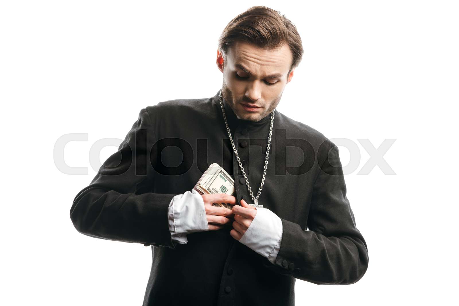 greedy catholic priest hiding money in cassock isolated on white ...
