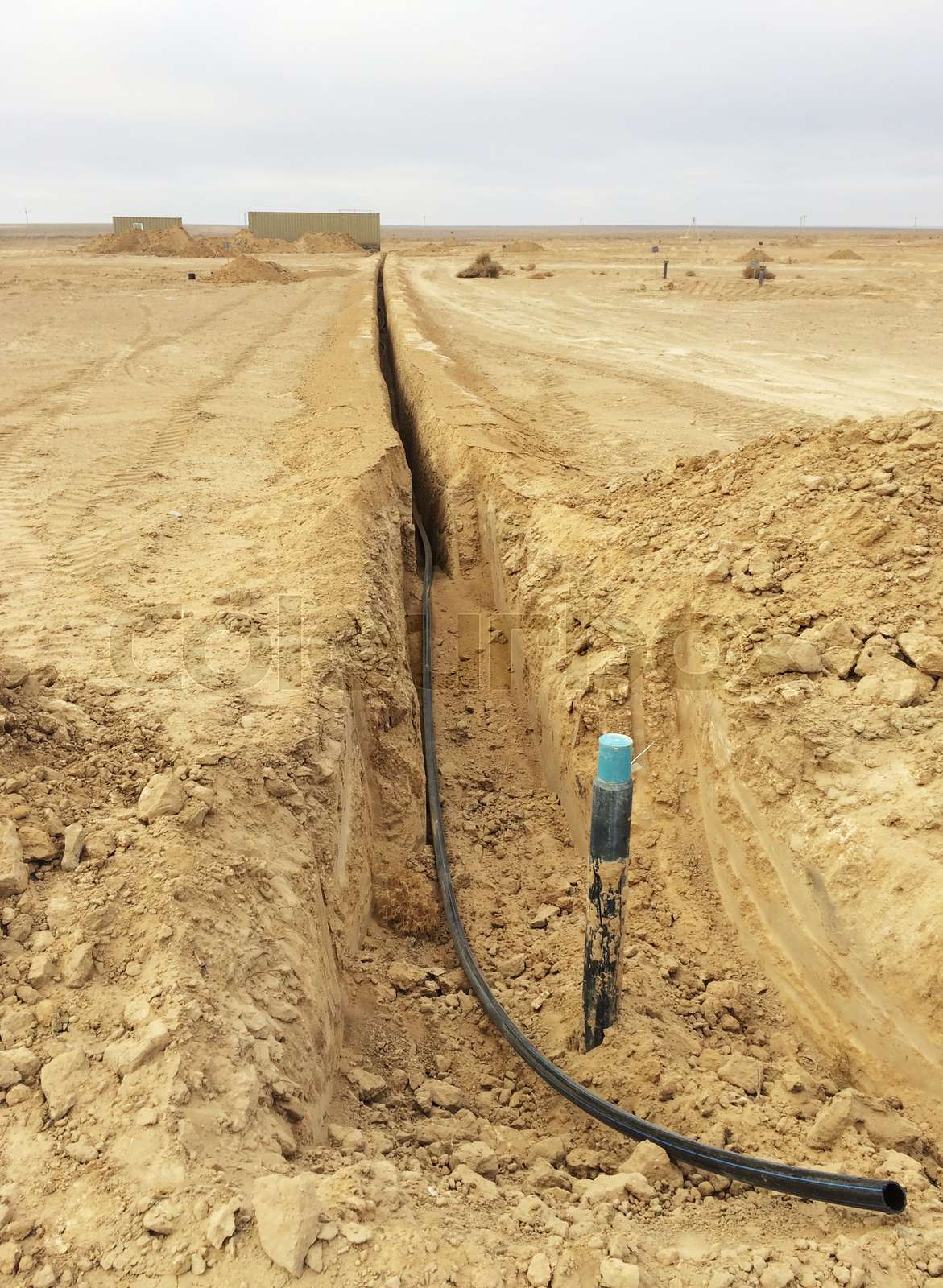 Process trench for laying pipe into steppes. | Stock image | Colourbox