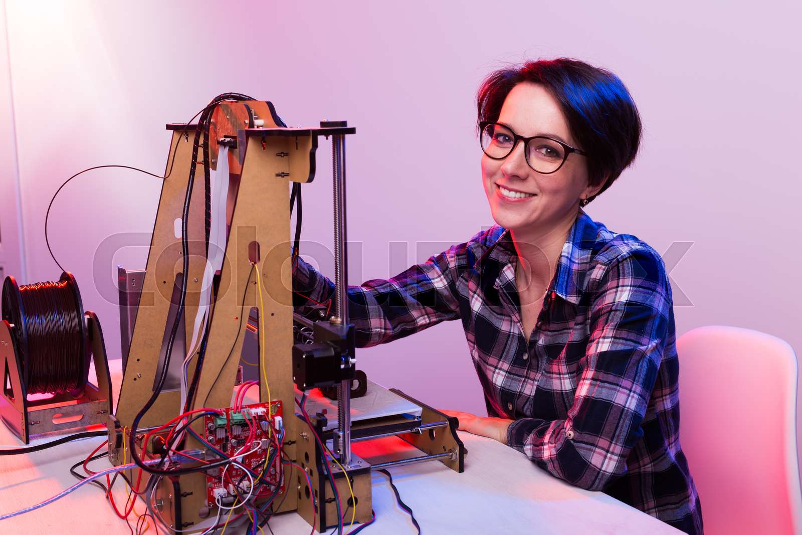Technology and engineering concept - Female engineer working in the lab ...