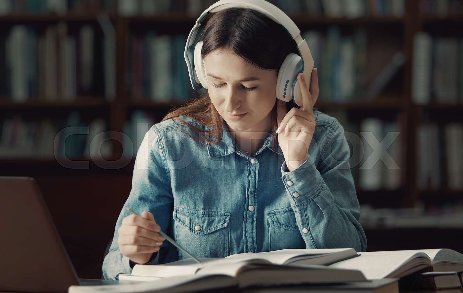 Female Student Listening Audio Lesson Stock Image Colourbox female-student-listening-audio-lesson-stock-image-colourbox