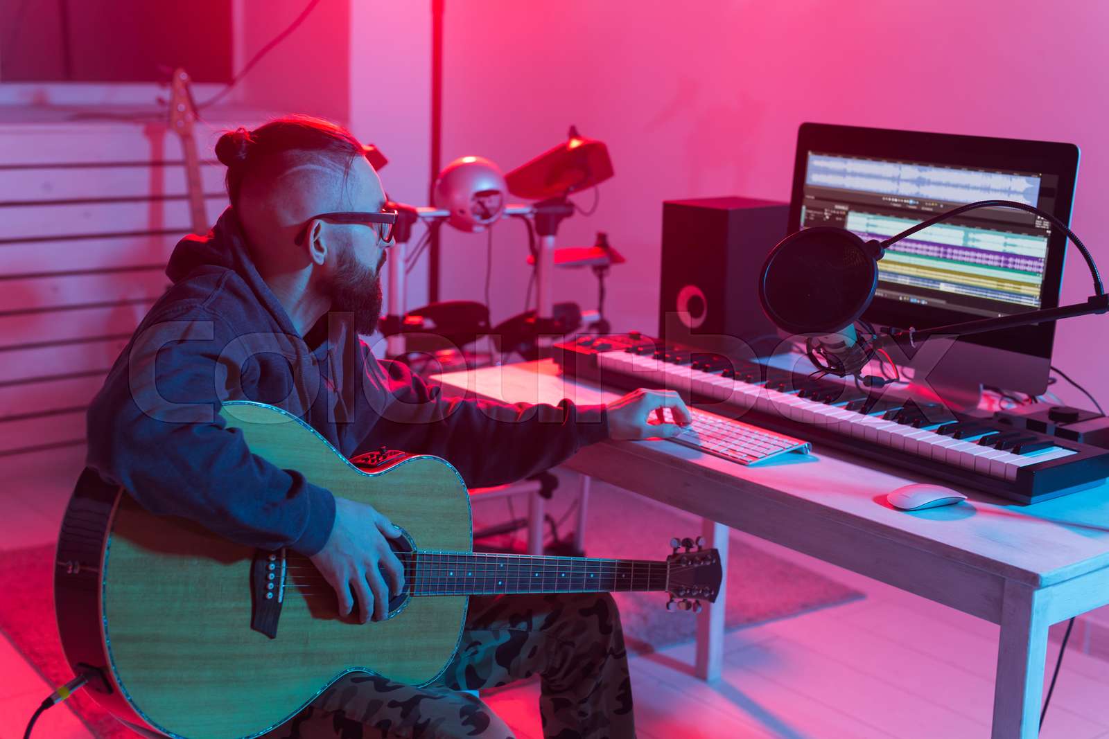 Create music and a recording studio concept - Bearded man guitarist ...
