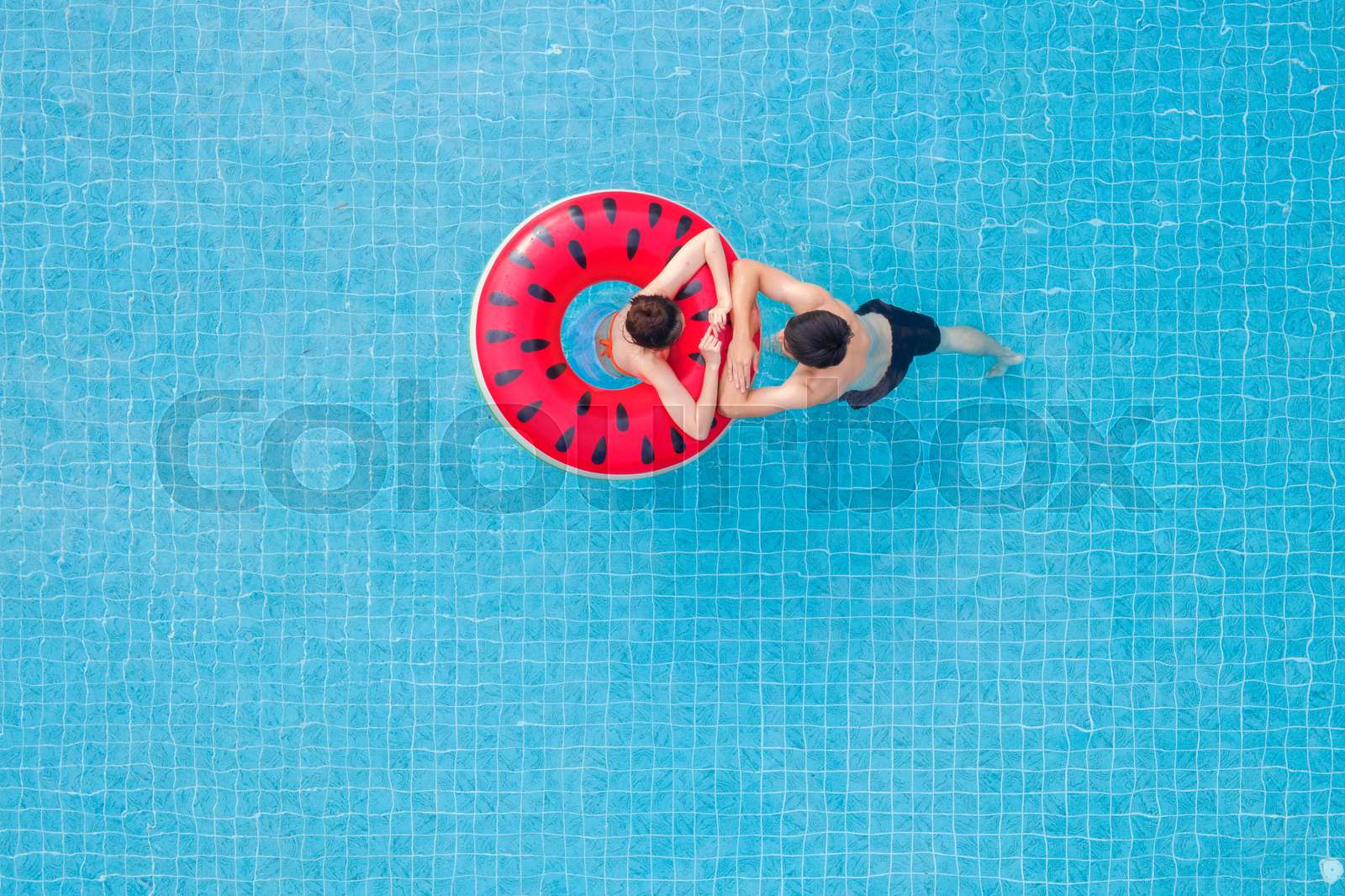 Asian couple in love in swimming pool on summer time | Stock image ...