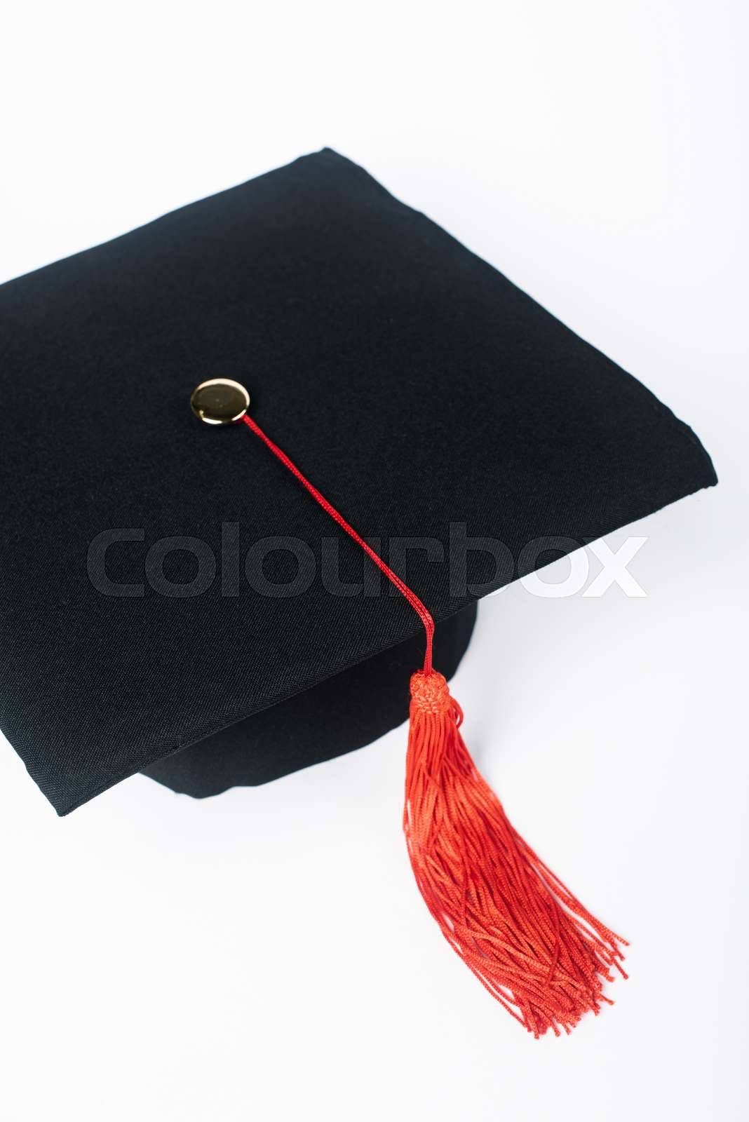 Black graduation cap with red tassel isolated on white | Stock image ...