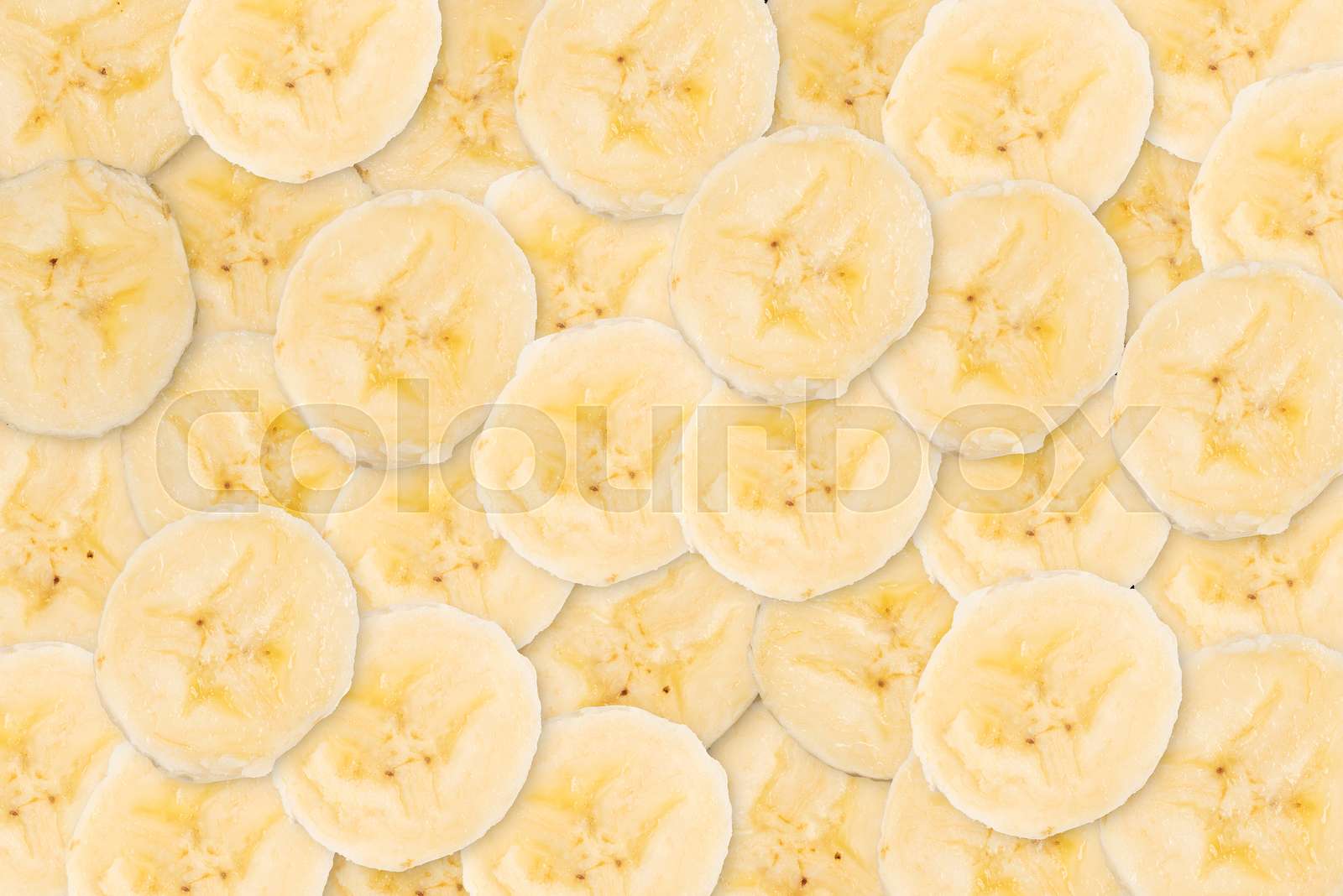 Background texture of sliced banana pieces. | Stock image | Colourbox