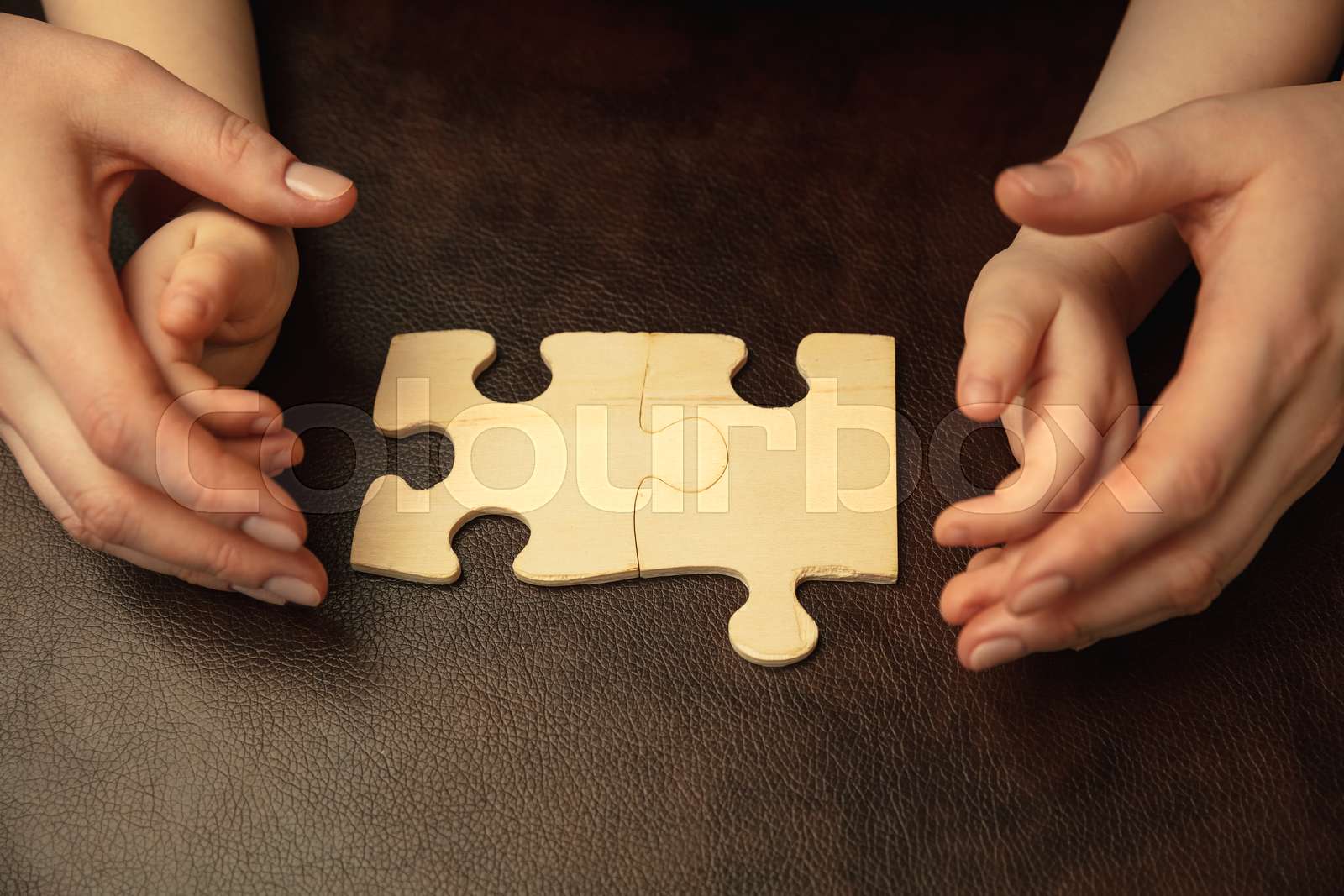 Close up of female and kid's hands doing things together, family, home ...