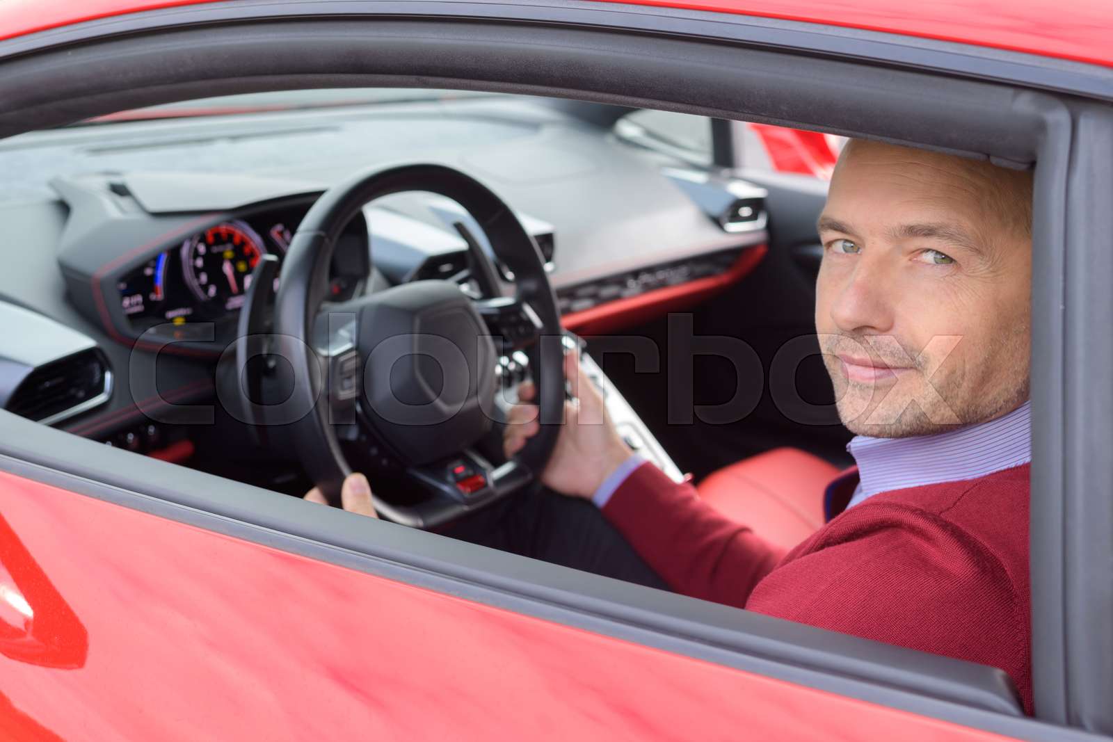 lucky man driving lamborghini lp-610 | Stock image | Colourbox
