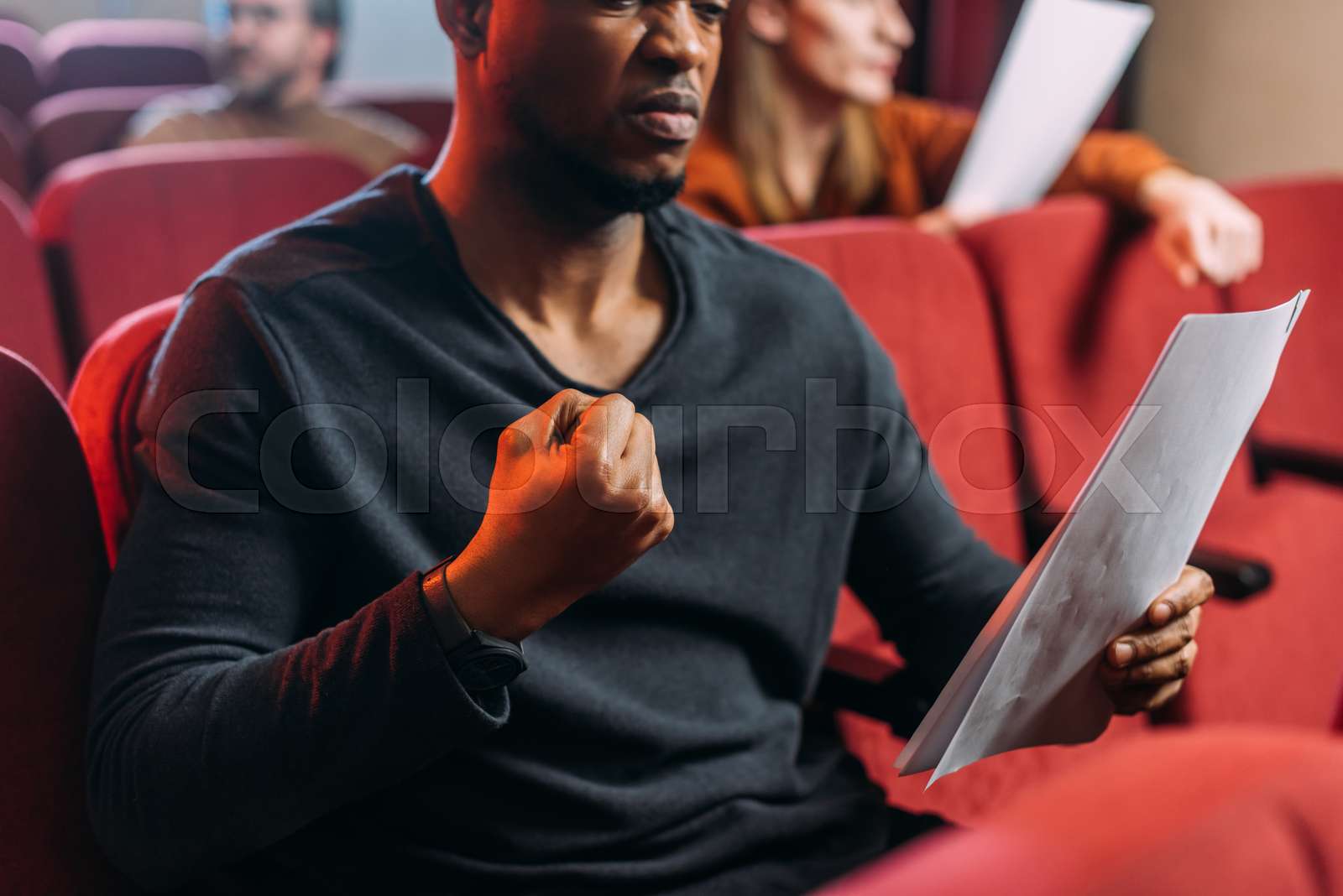 multicultural angry actor and actresses reading scripts in theater ...