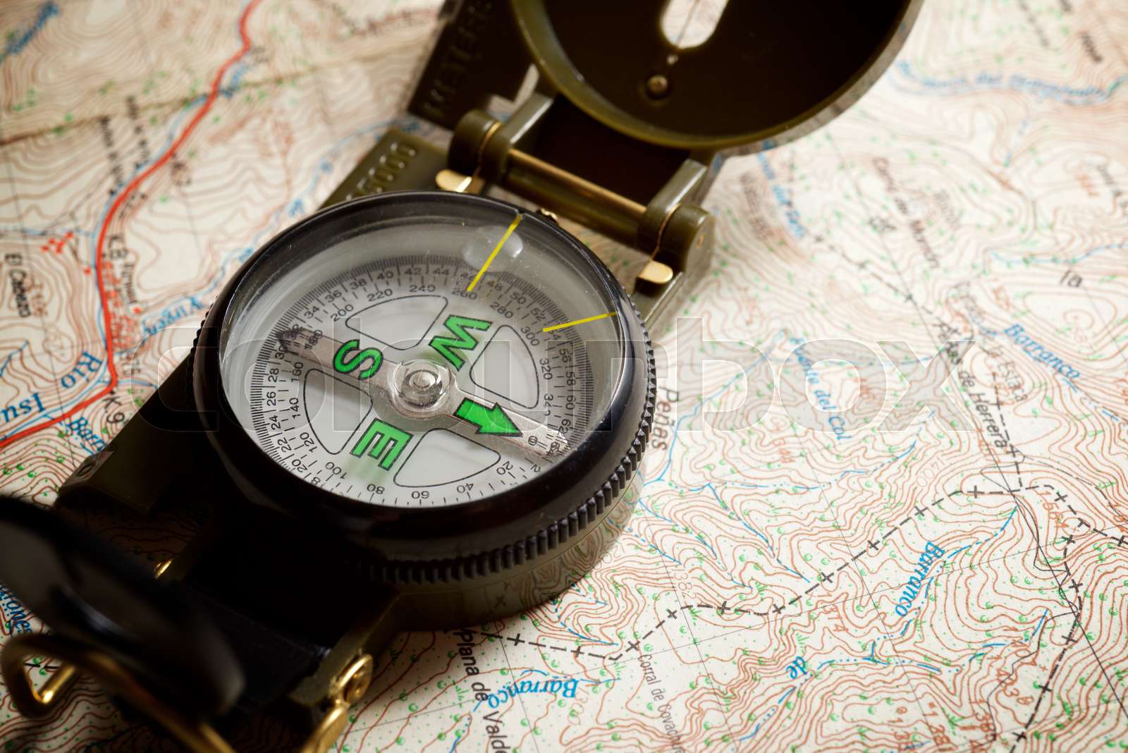 Compass on a map | Stock image | Colourbox