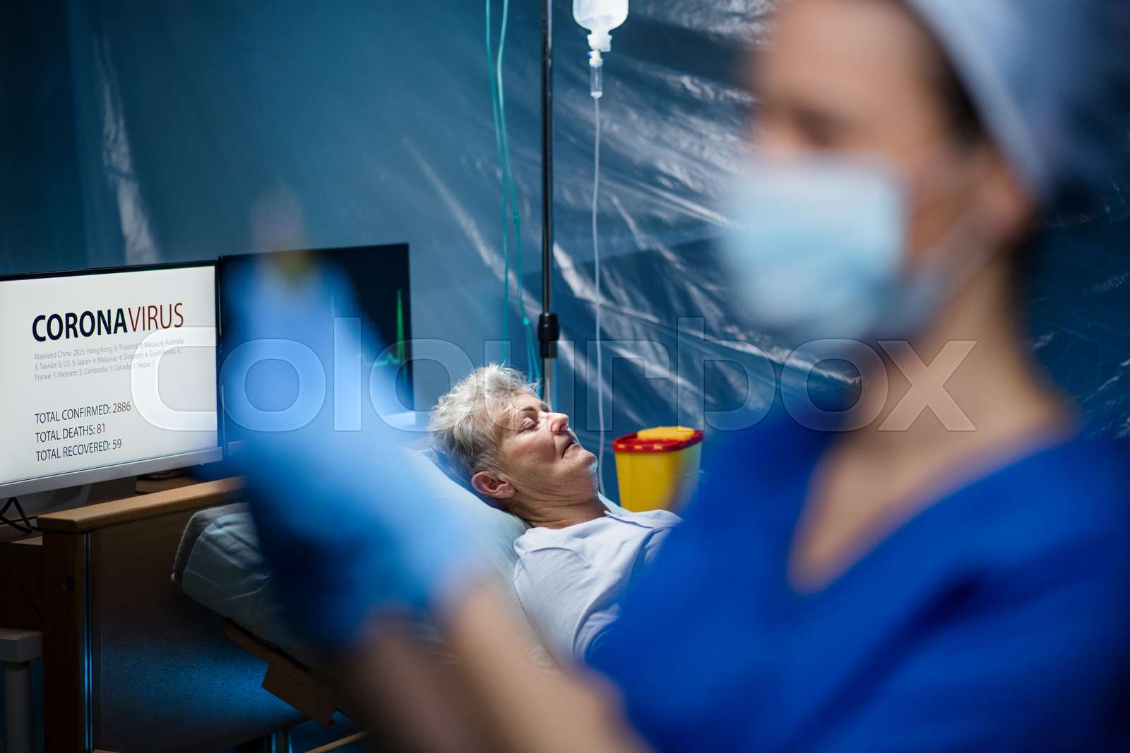 Infected patient in quarantine lying in bed in hospital, coronavirus ...