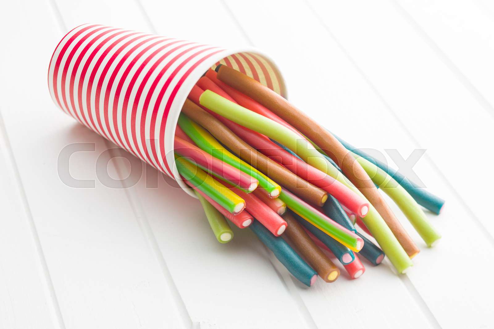 Sweet gummy sticks with different flavor. | Stock image | Colourbox