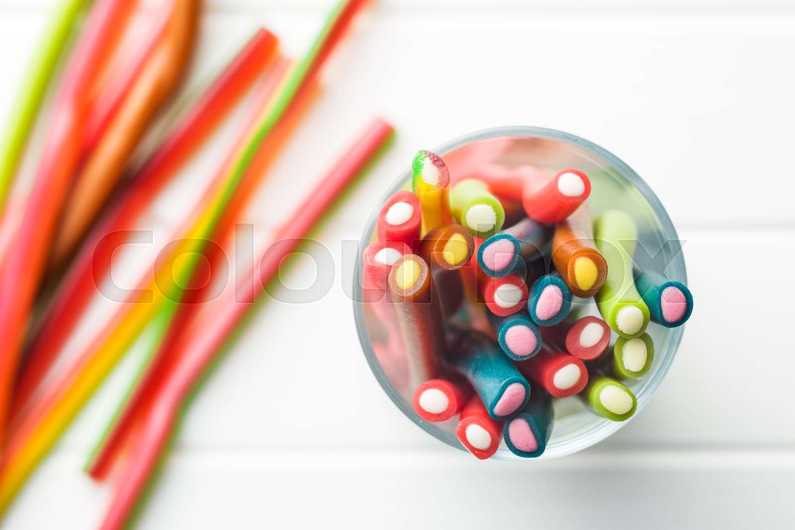 Sweet gummy sticks with different flavor. | Stock image | Colourbox