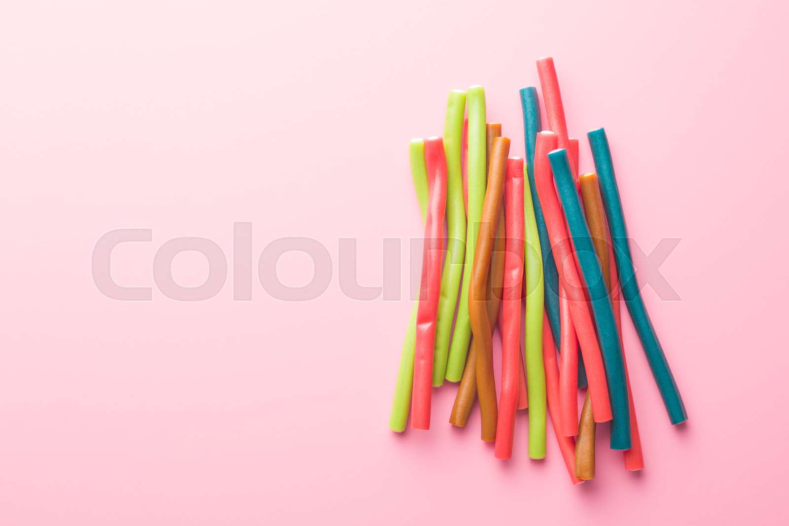 Sweet gummy sticks with different flavor. | Stock image | Colourbox