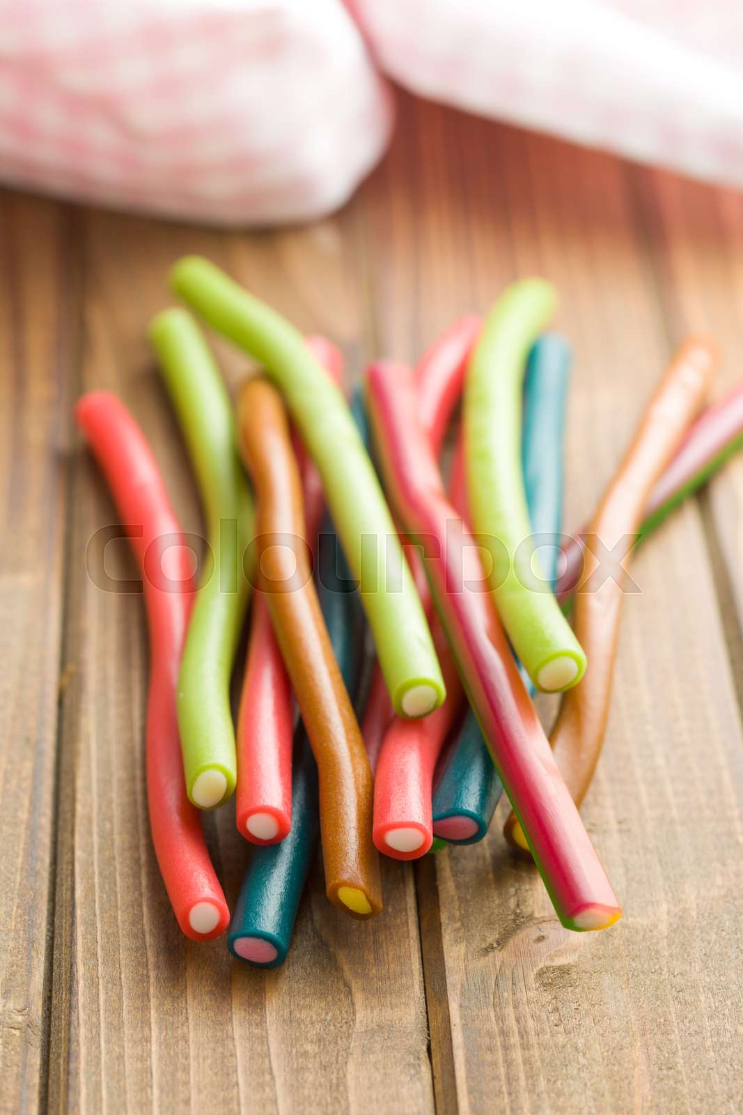 Sweet gummy sticks with different flavor. | Stock image | Colourbox