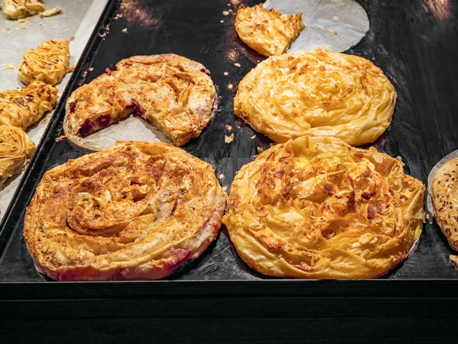 Golden brown baked puff pastry buns | Stock image | Colourbox