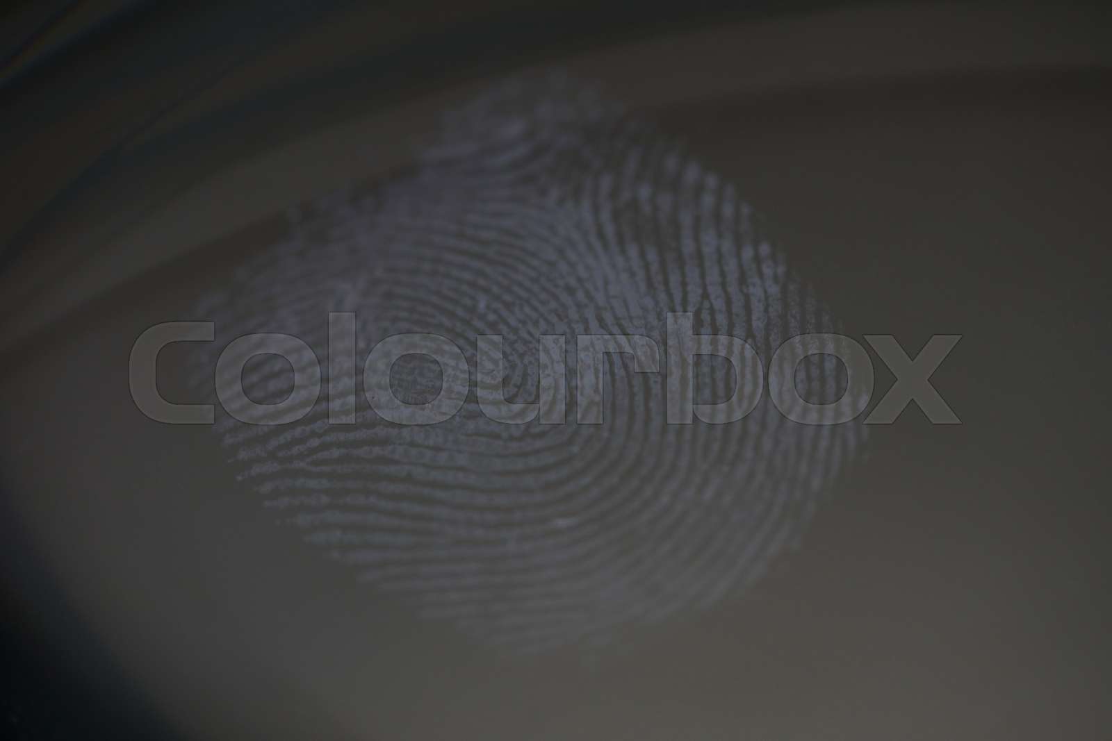 Fingerprint mark on clear glass as crime evidence | Stock image | Colourbox
