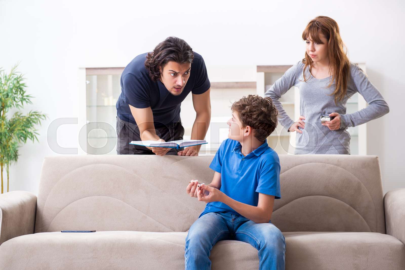 Concept of underage smoking with young boy and family | Stock image ...