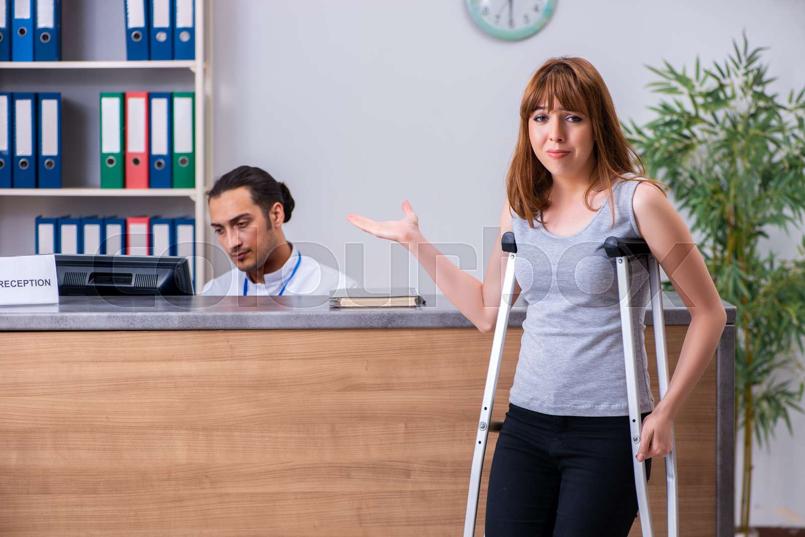 Young patient at the reception in the hospital | Stock image | Colourbox