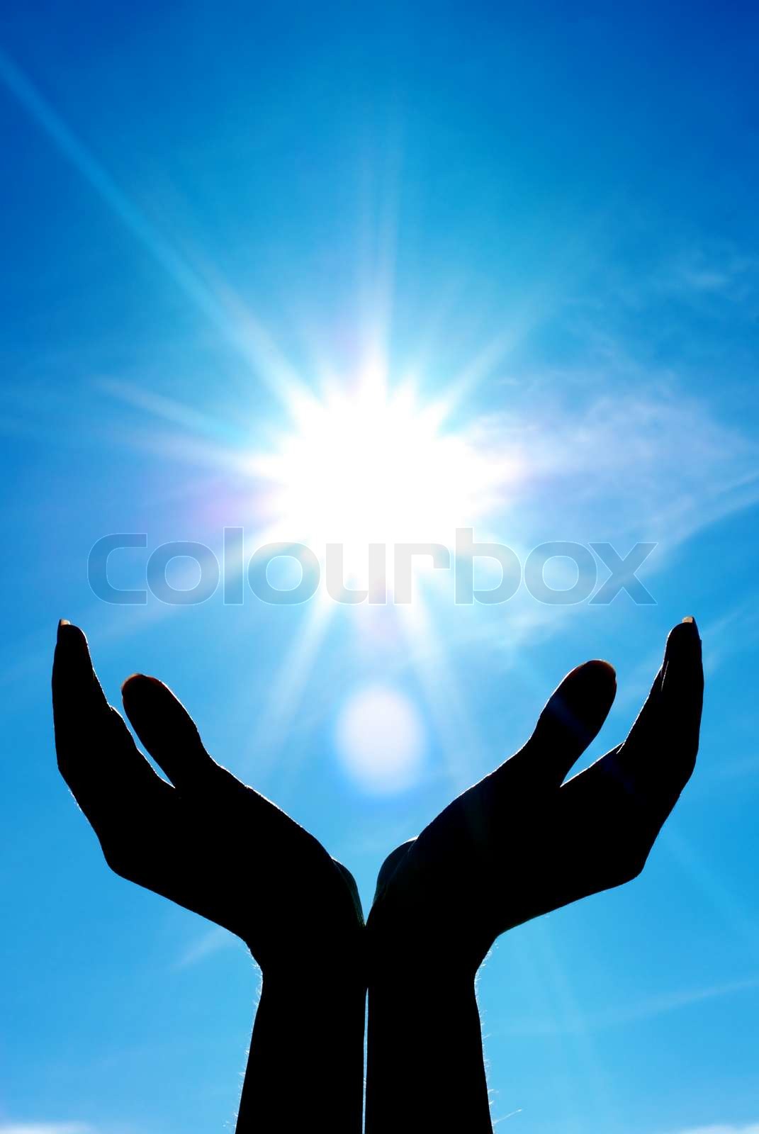 Hands and sun | Stock image | Colourbox