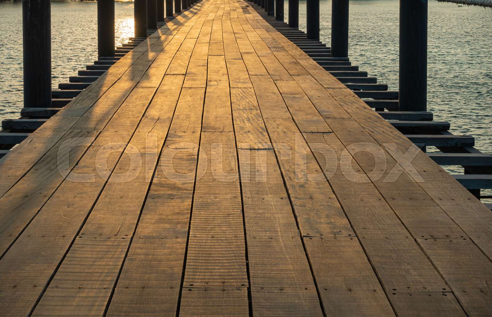 Wooden bridge in sea | Stock image | Colourbox