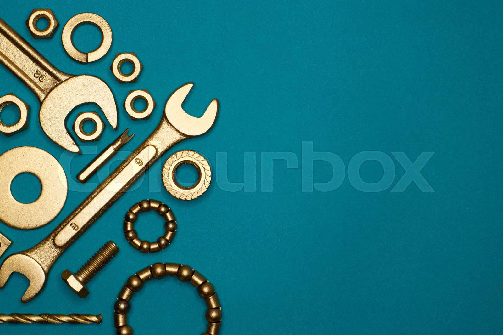 composition of golden tools on blue background | Stock image | Colourbox