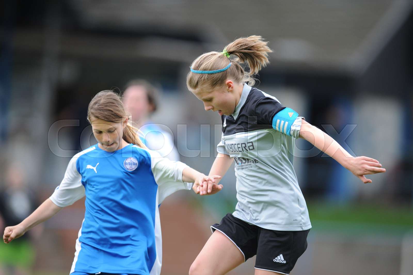 Girls playing football | Stock image | Colourbox