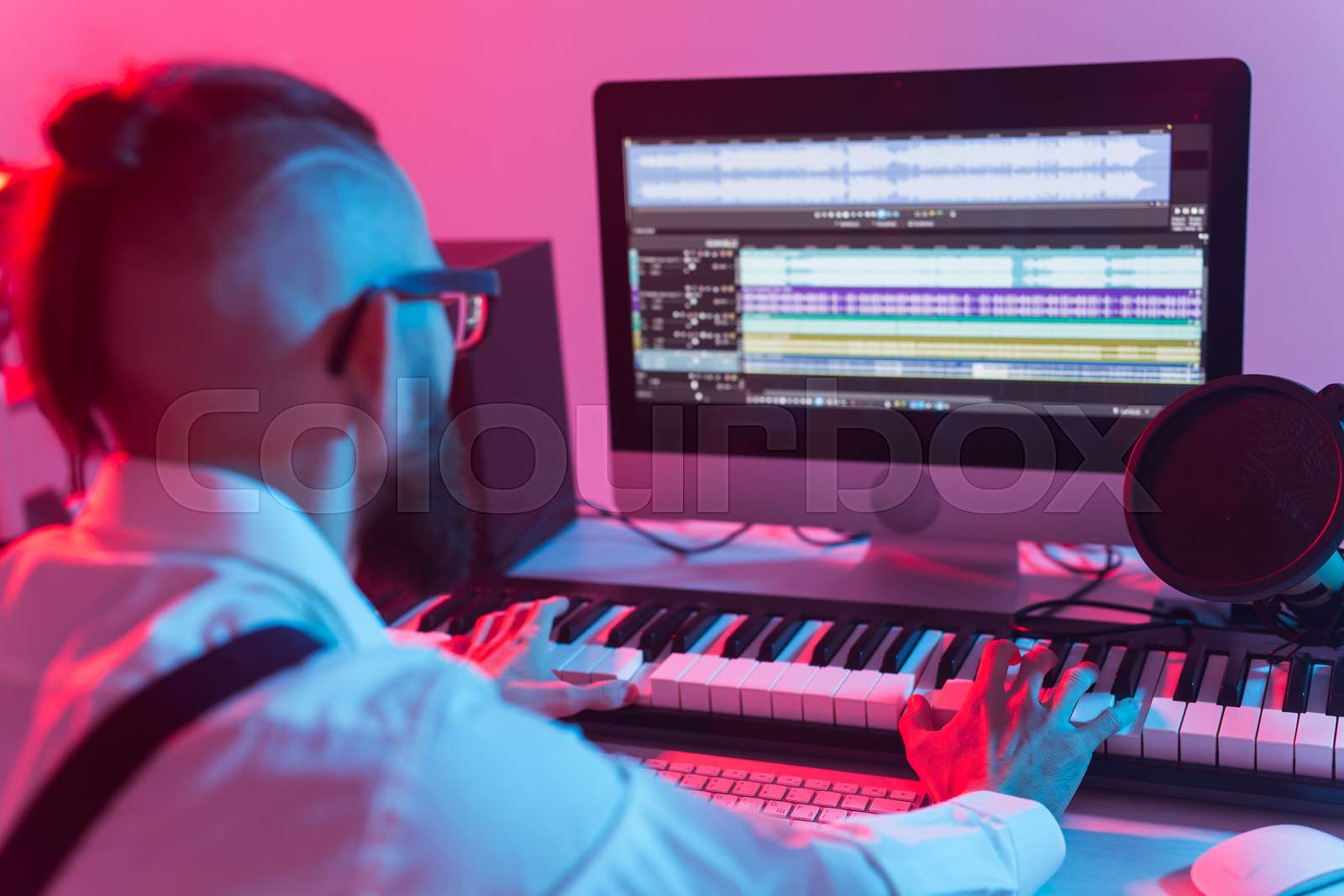 Musician and making music concept - Male sound producer working in ...