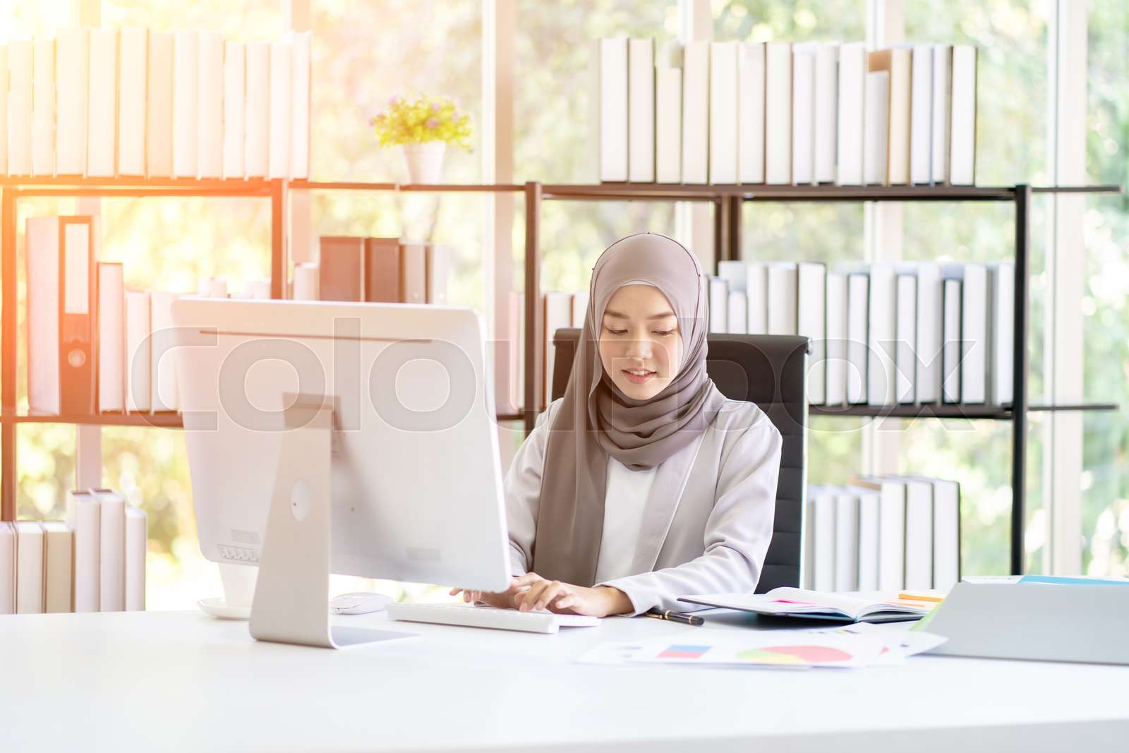 Muslim Business Woman in Hijab with Documents at Workplace in Office ...