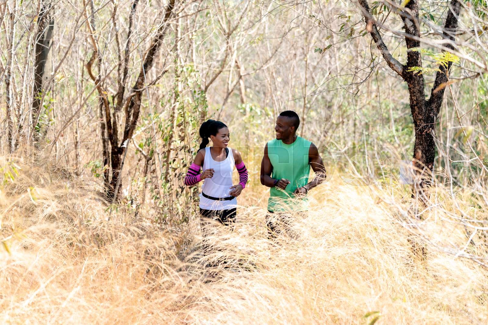 Young Black Couple Running at Forest Trail. | Stock image | Colourbox