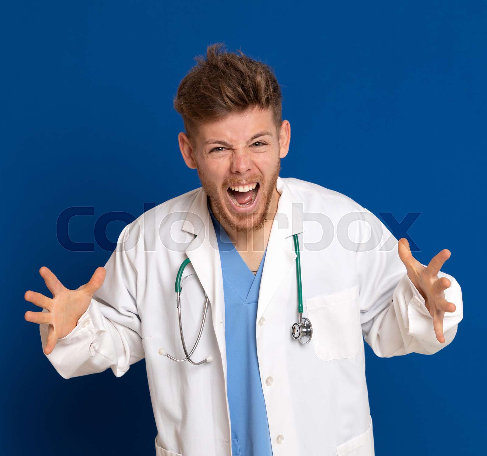 Doctor wearing a white lab coat | Stock image | Colourbox