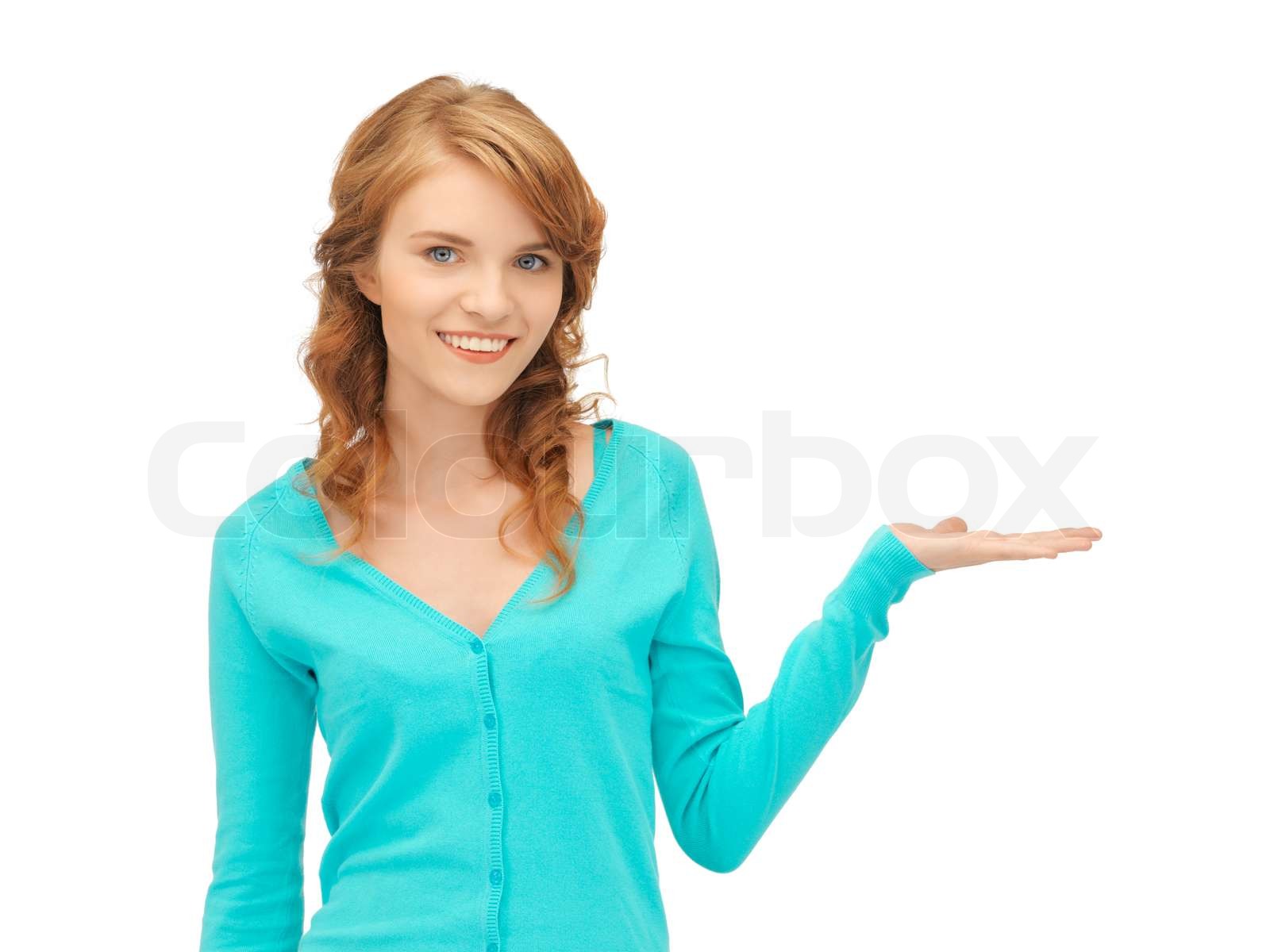 girl showing something on the palm of her hand | Stock image | Colourbox