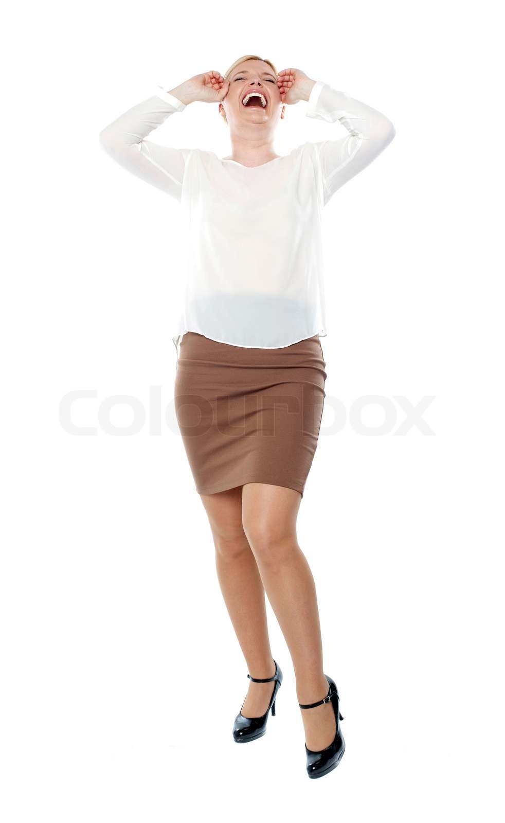Pretty woman laughing loud. Full length shot | Stock image | Colourbox